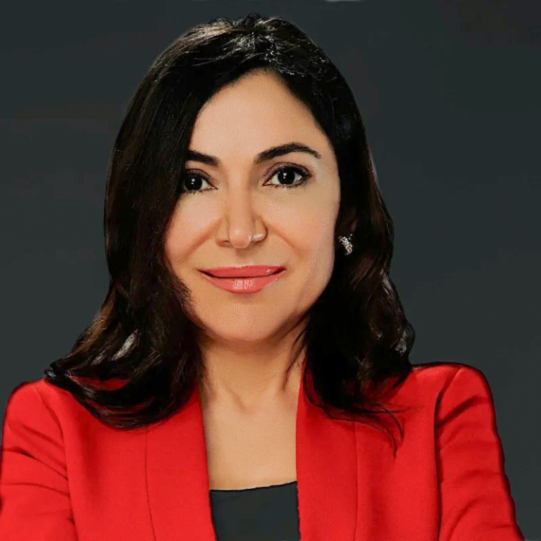 Laura Reynaud Bio – AmCham Abu Dhabi
